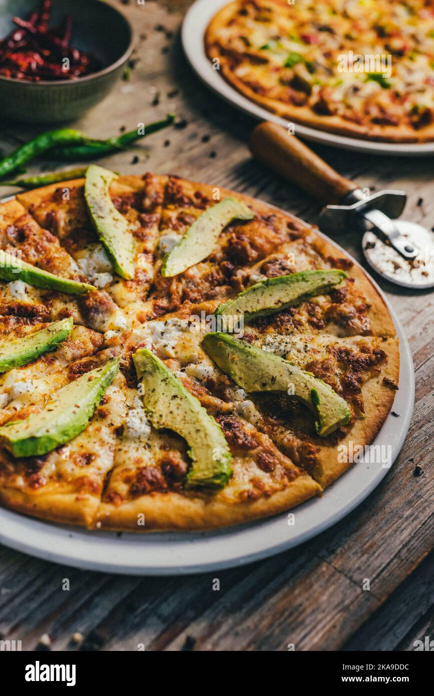 Pizza photography at restaurant with props Stock Photo - Alamy