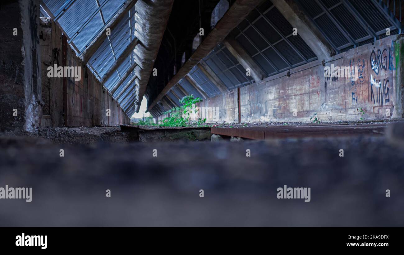 A view of an empty interior of an abandoned industrial building Stock ...