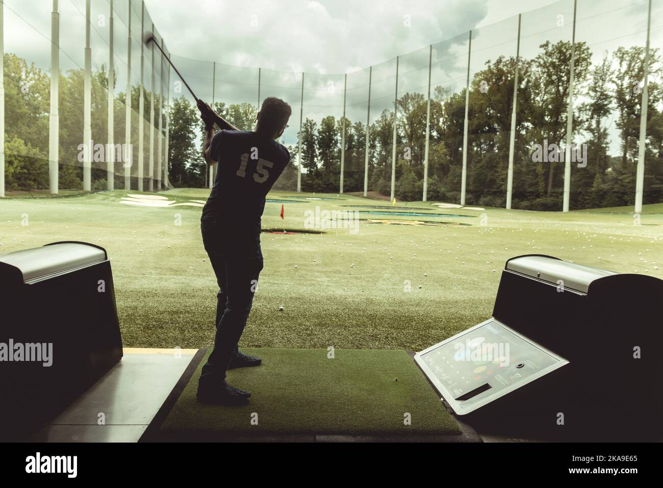 A back view of female playing golf in golf field Stock Photo - Alamy