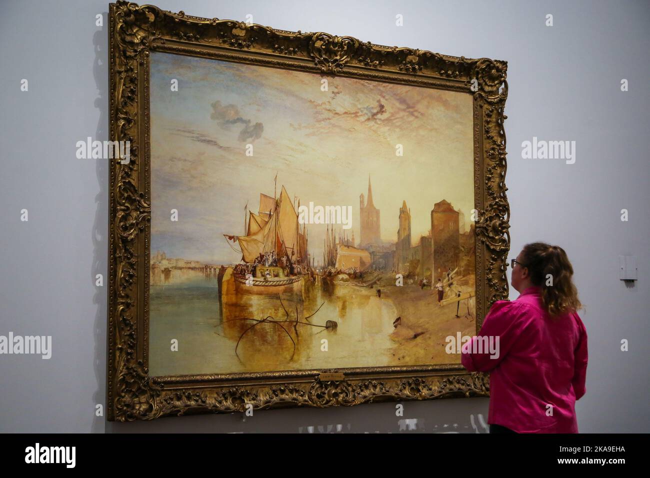 A National gallery staff member views British artist Joseph Mallord ...