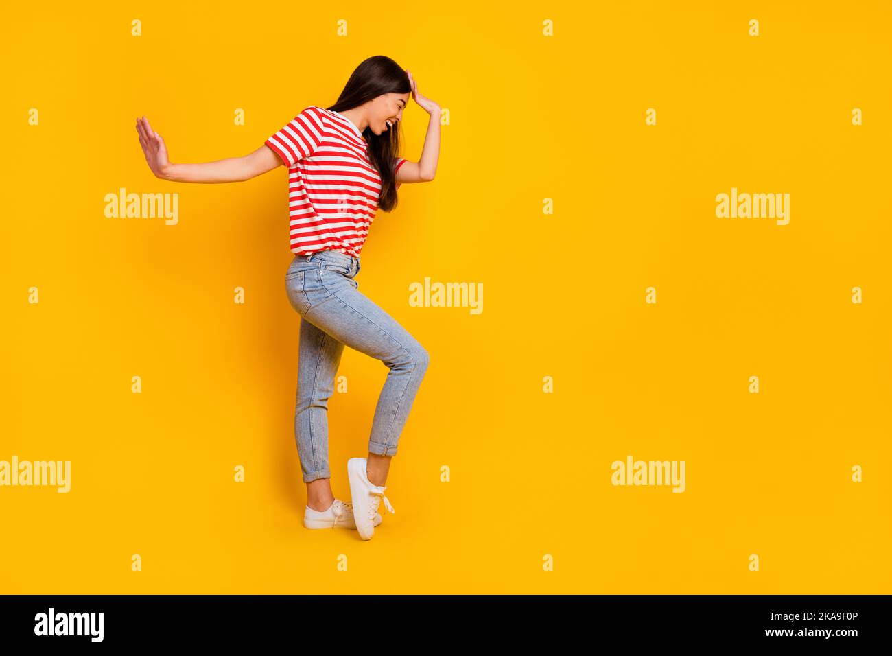 Full length profile photo of charming cheerful girl have fun good mood ...