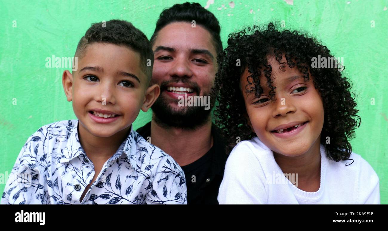Hispanic father with children, latin kids with parent smiling, real ...