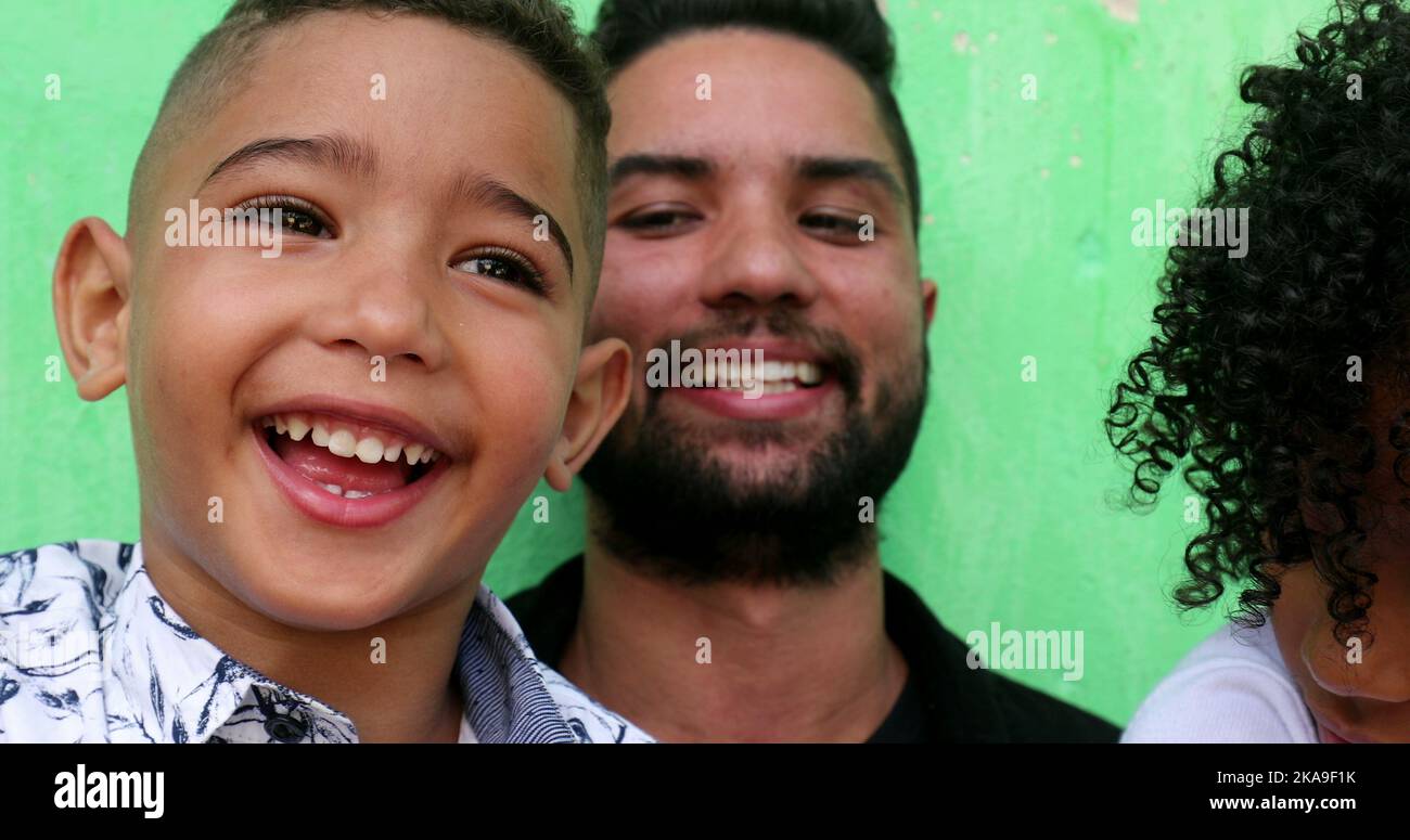 Hispanic father with children, latin kids with parent smiling, real ...