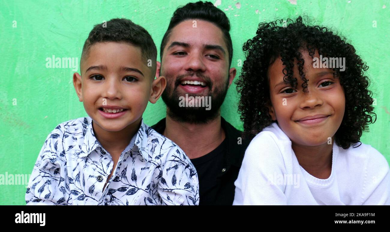 Hispanic father with children, latin kids with parent smiling, real ...