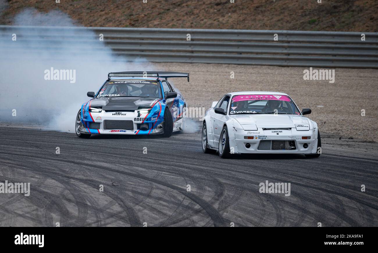 Nissan Silvia S13 drifting on the racing circuit battle Stock Photo - Alamy