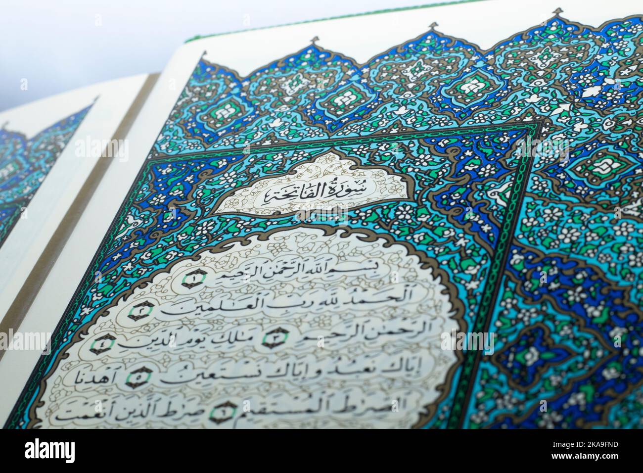 A closeup shot of the opening chapter 1 of the Holy Quran Stock Photo ...