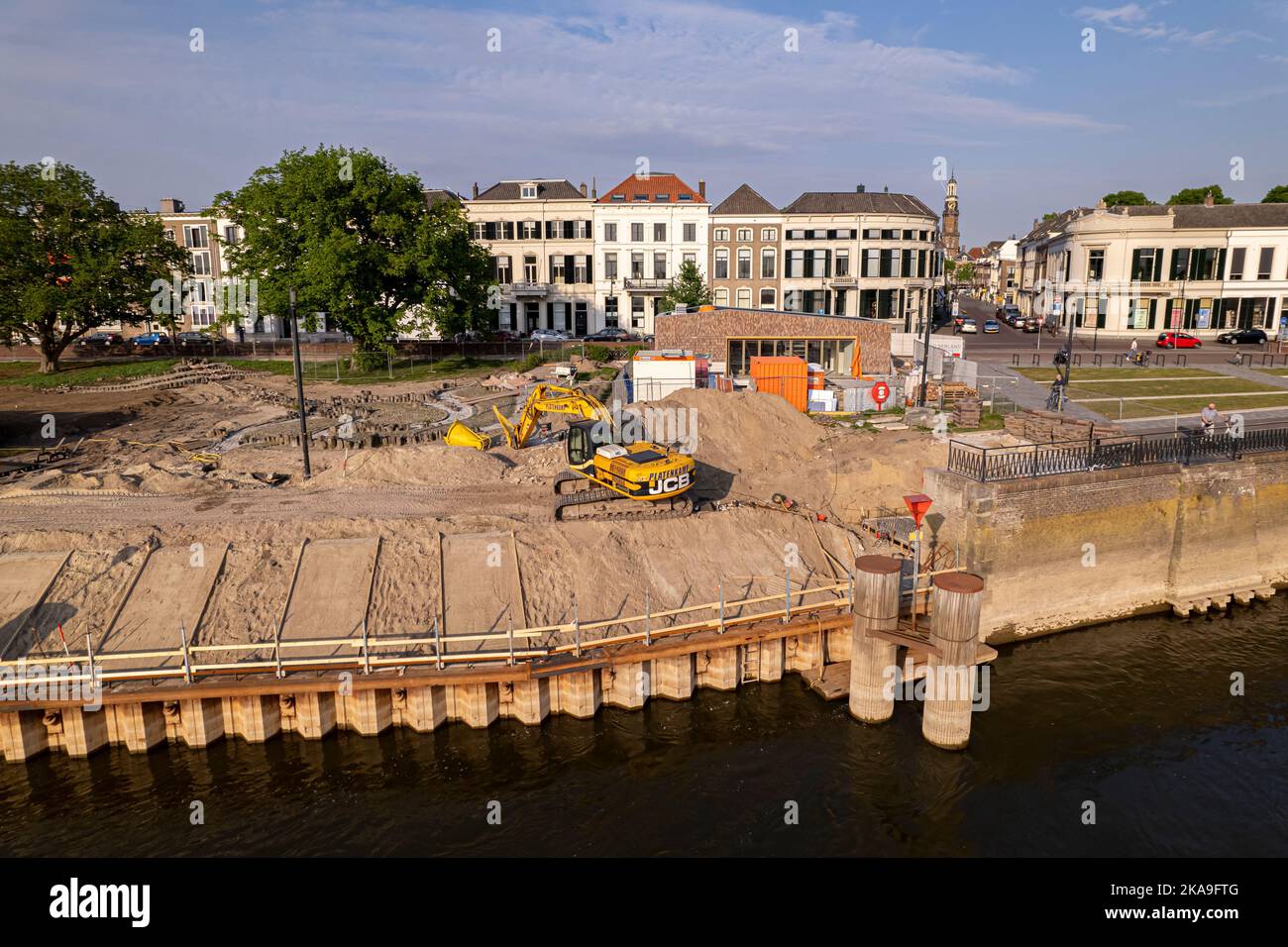 Quay under construction seen from above river IJssel with work in ...