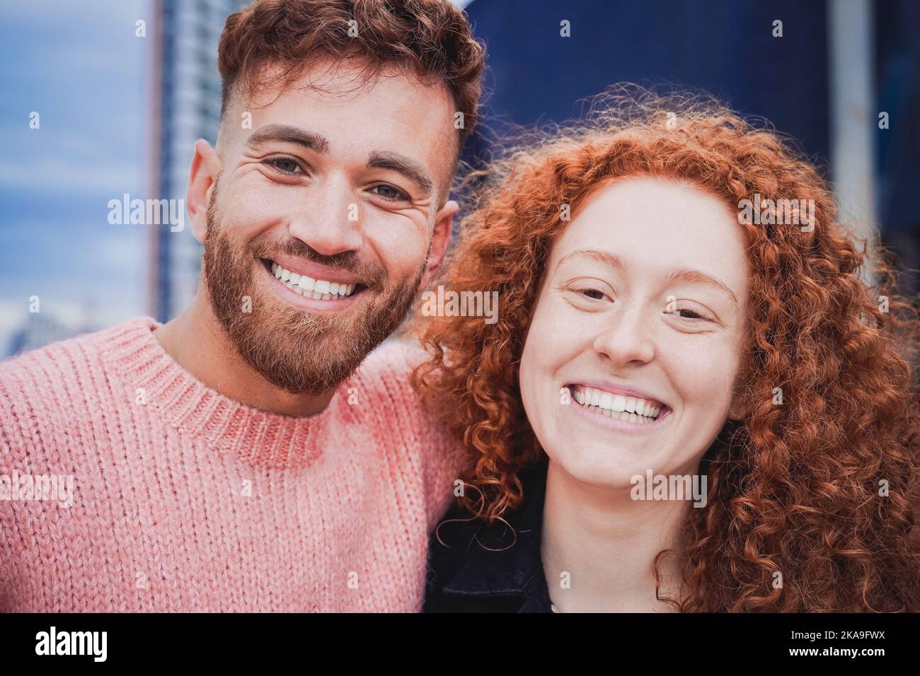 Happy red ginger hair brother and sister having fun doing selfie ...