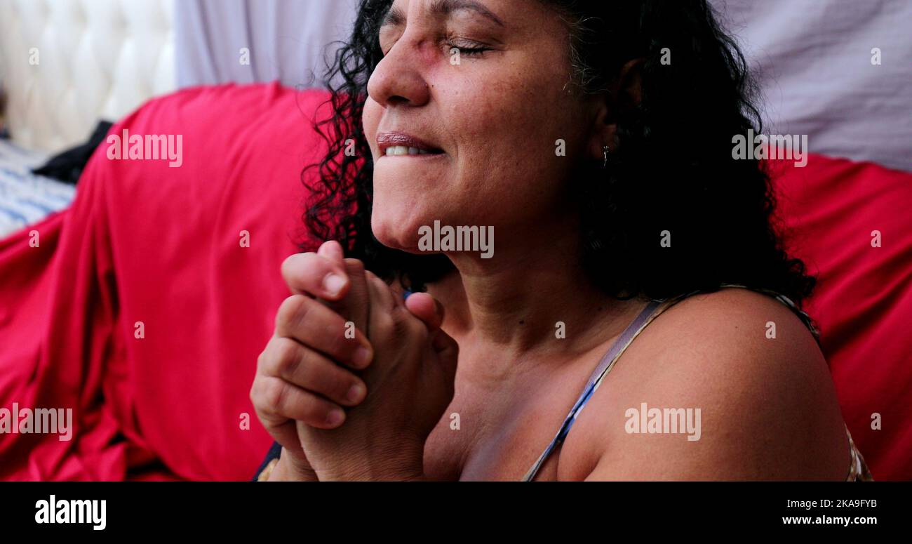 Hopeful Brazilian woman looking up seeking divine help. Latin person ... Hopeful Brazilian woman looking up seeking divine help. Latin person ...