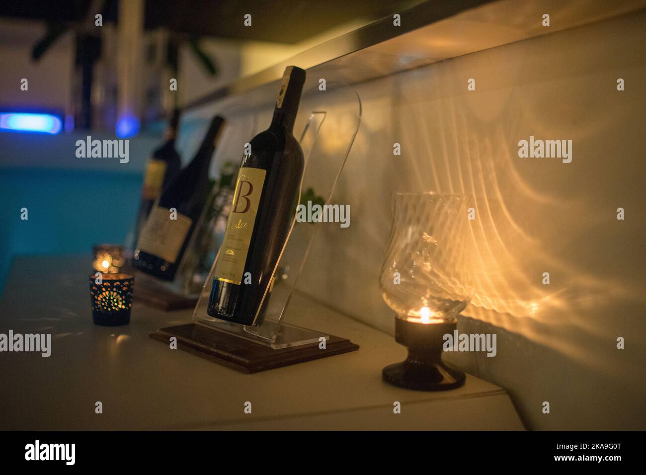 Different wine bottles in a luxurious restaurant Stock Photo - Alamy