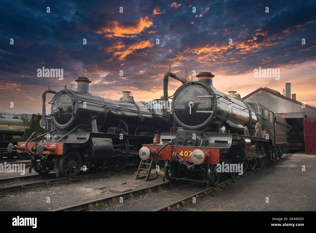 Sunset scene with Steam locomotive No.5322 (left) and (right) No. 4079 ...