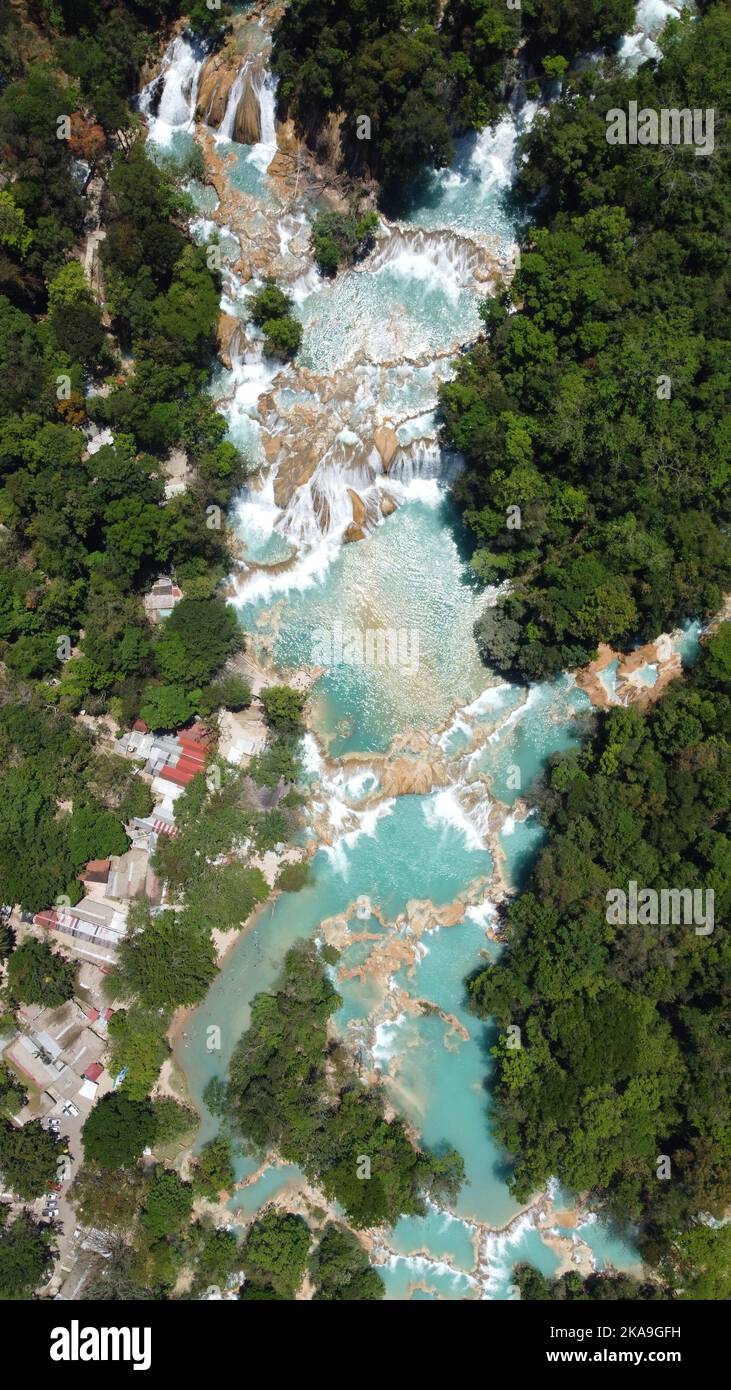 A vertical shot of an aerial view of the Agua Azul waterfalls in ...