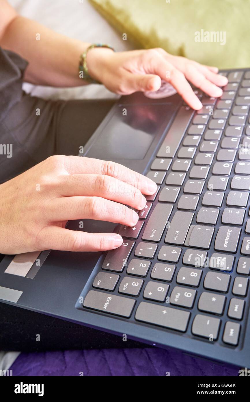 Hands typing laptop buttons hi-res stock photography and images - Alamy
