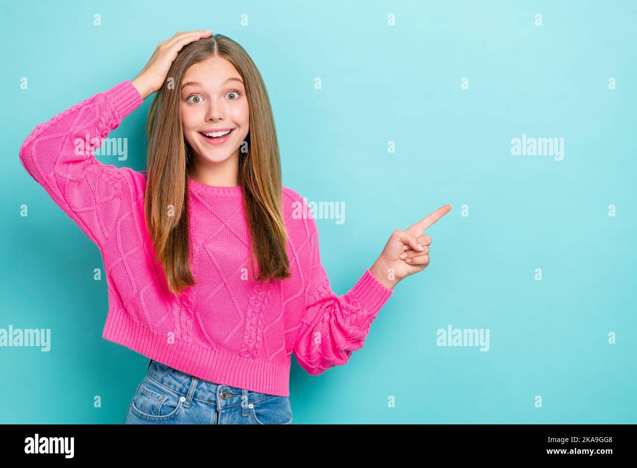 Photo of impressed girl straight hairstyle wear pink knit sweater ...