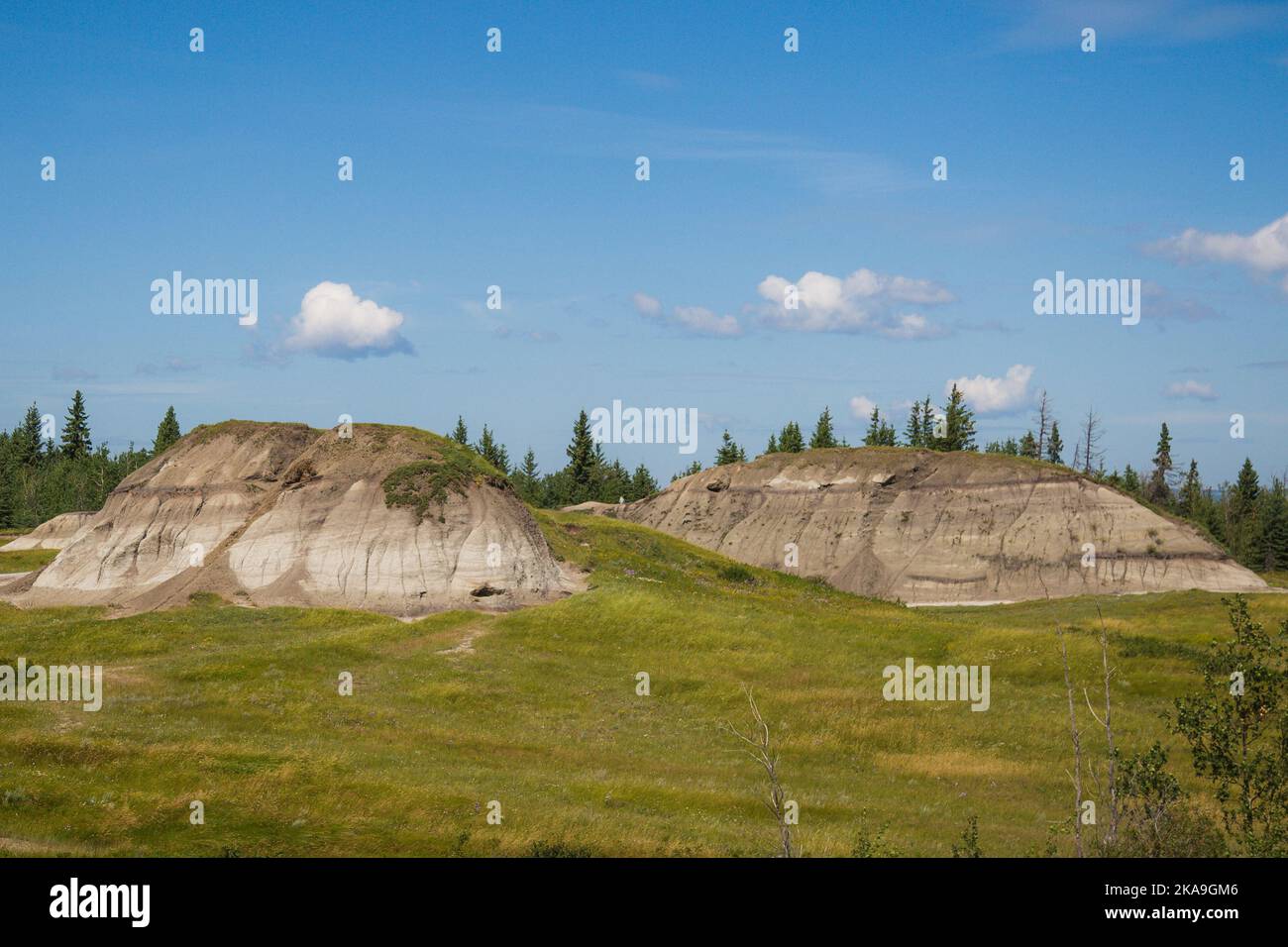 A beautiful view of rocky hills surrounded by greenery Stock Photo - Alamy