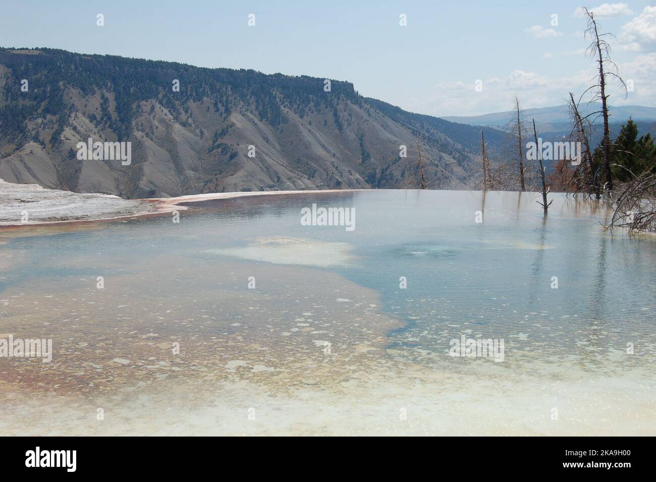 The hot spring infinity pool view with a little fog Stock Photo - Alamy
