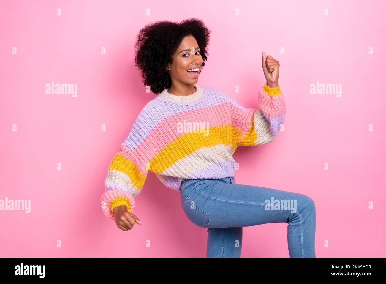 Photo of cute positive excited schoolgirl teenager fists up celebrate ...