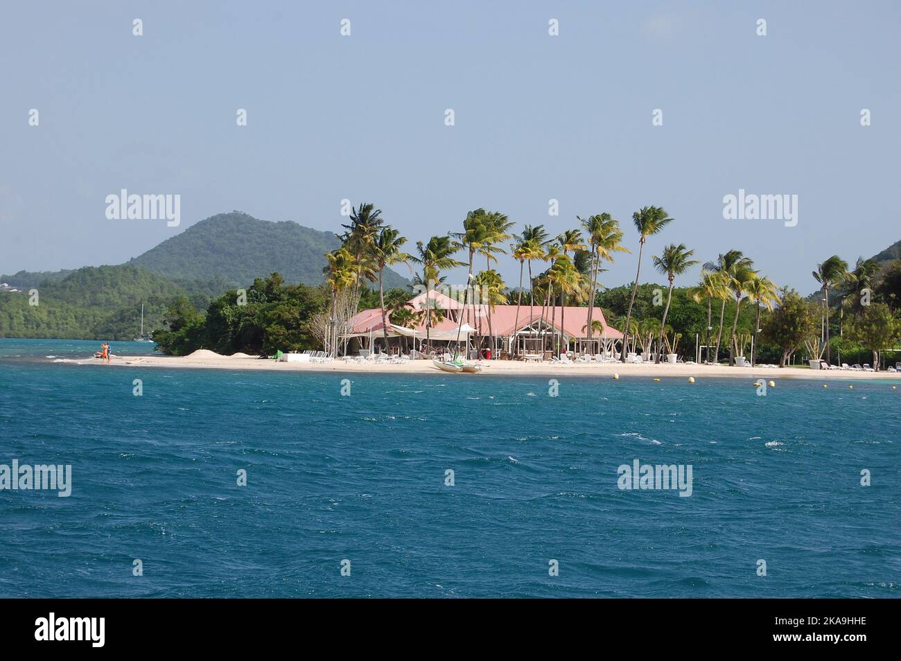 A big party house built on the island right next to the beach ...