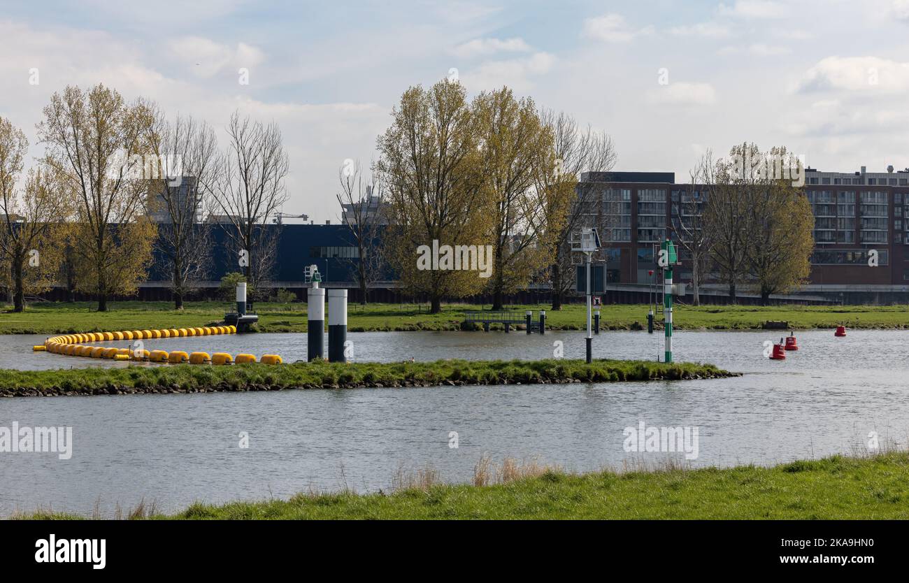A buoy line in the river Maas, the Netherlands Stock Photo - Alamy