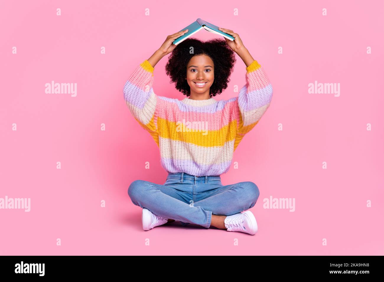 Full length photo of charming cute small kid wear striped sweater ...