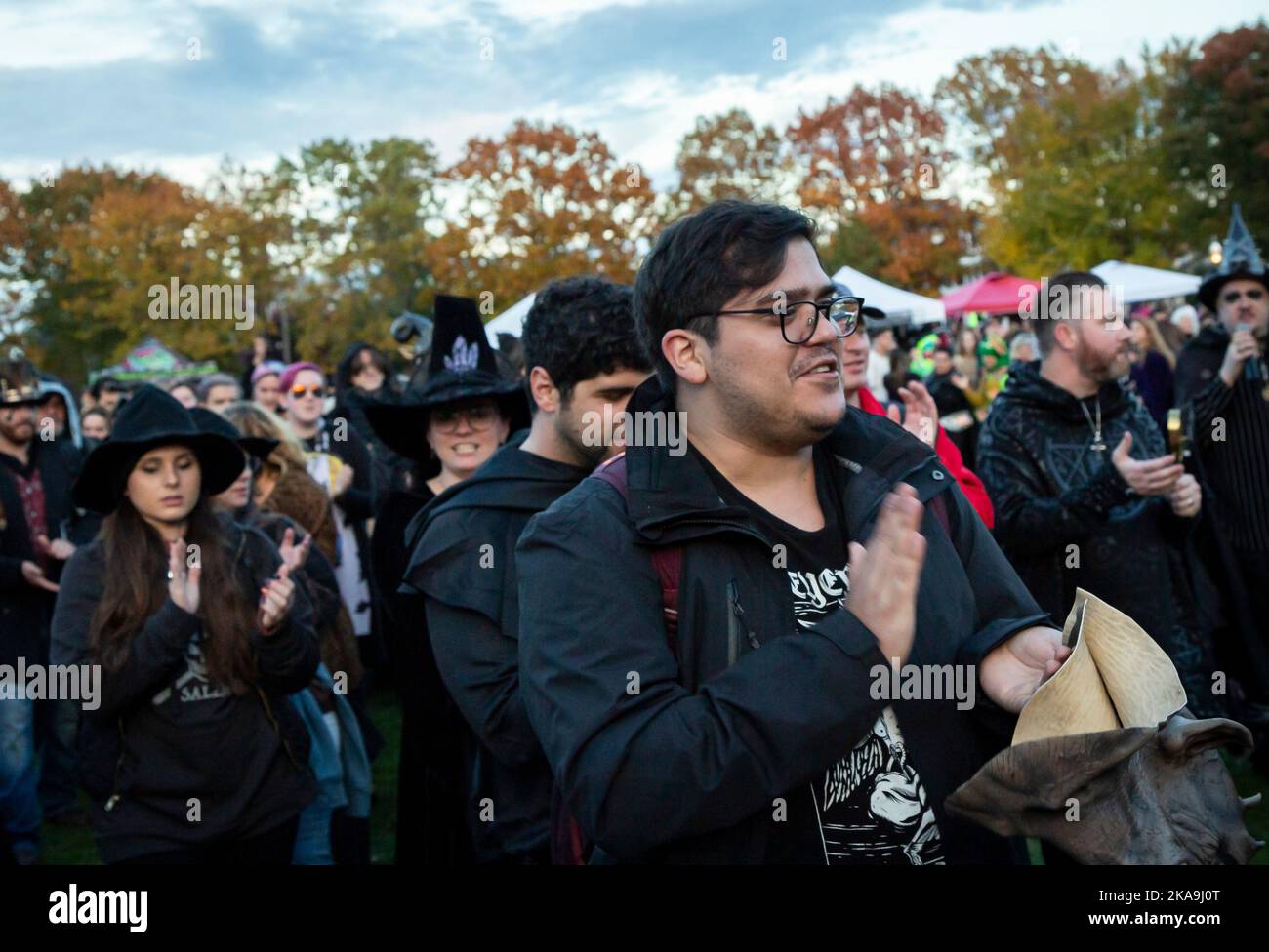 October 31, 2022. Salem, MA. The Salem Witches' Magic Circle. Hundreds ...