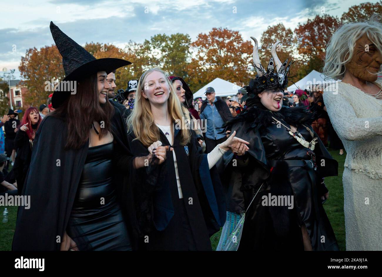 October 31, 2022. Salem, MA. The Salem Witches' Magic Circle. Hundreds ...