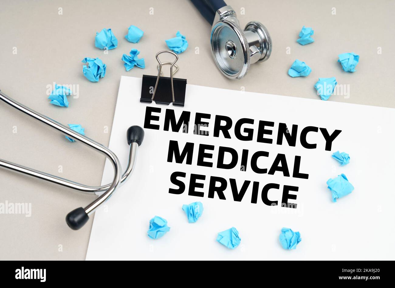 Medicine concept. On the table is a stethoscope, a pen, blue crumpled ...