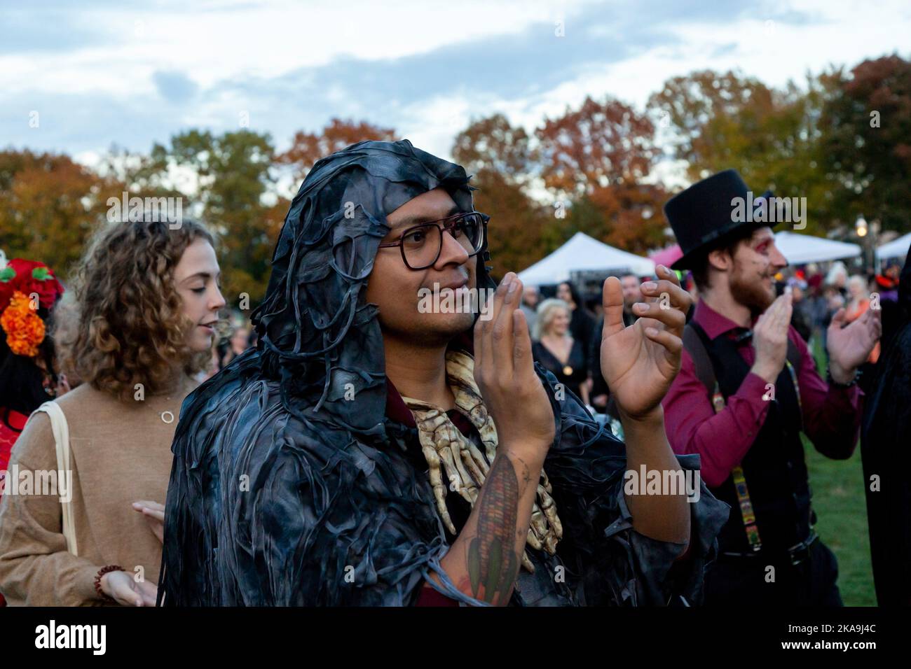 October 31, 2022. Salem, MA. The Salem Witches' Magic Circle. Hundreds ...