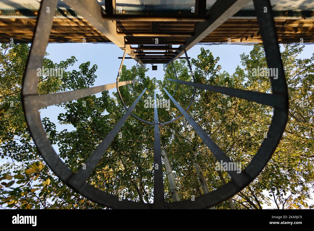A low angle of a metal structure of an exit ladder on the side of a ...