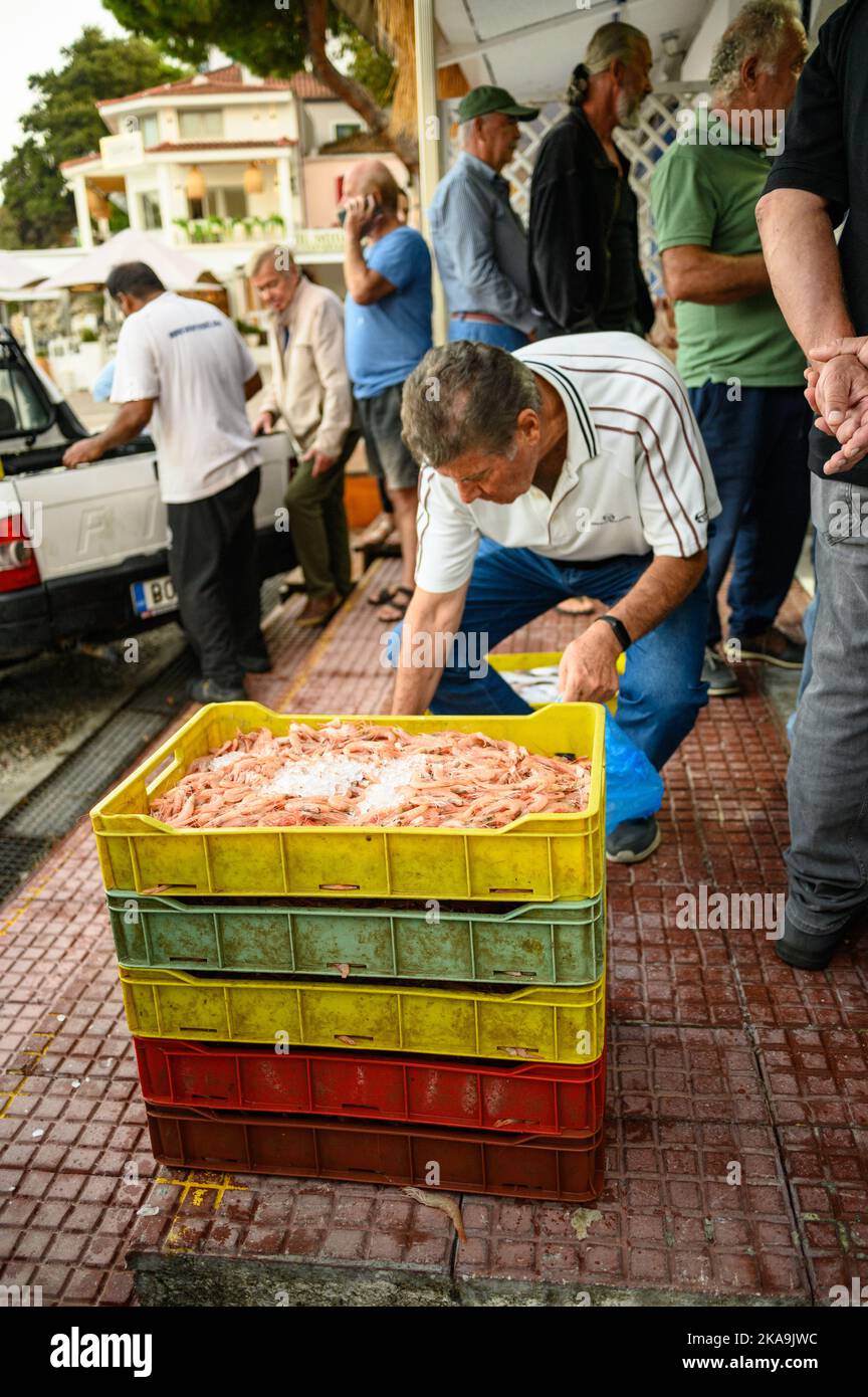 Buying fish at the fish market.Skiathos island Greece Stock Photo - Alamy