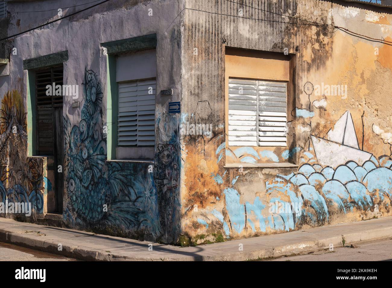 The graffiti painted on the walls of the house Stock Photo - Alamy