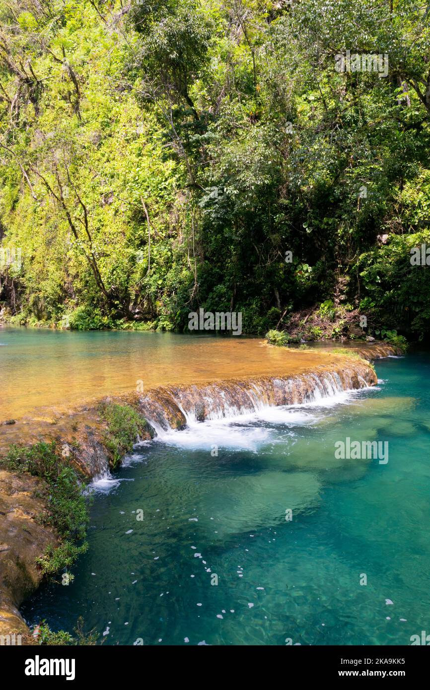 A large river and Semuc Champey natural monument in Guatemala, vertical ...