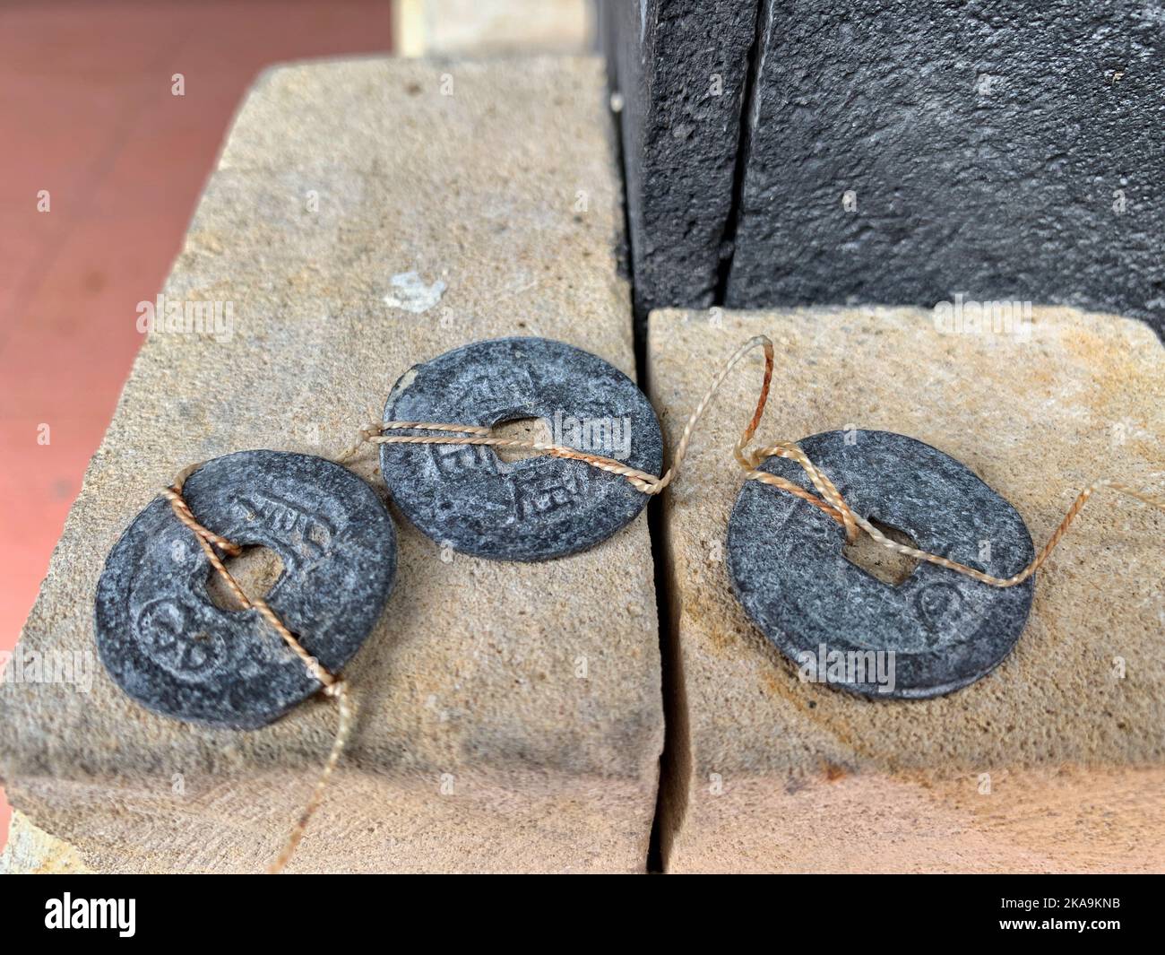 Balinese coin hi-res stock photography and images - Alamy