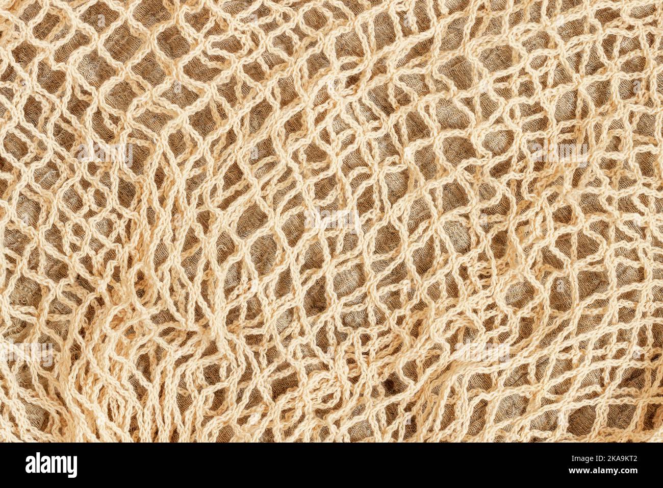 Natural background of mesh string reusable knitted bag. Concept of zero ...