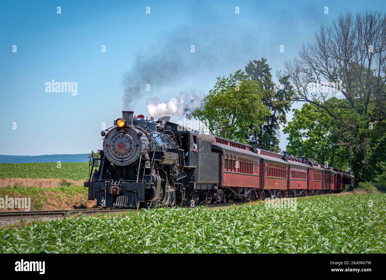 View of an Antique Restored Steam Passenger Train Approaching Along a ...