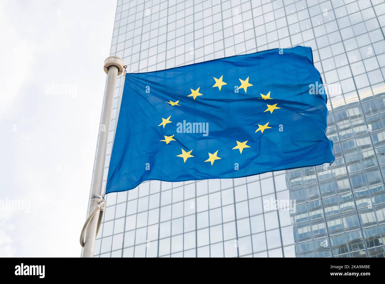 EU flag blue on the background of the building Stock Photo - Alamy