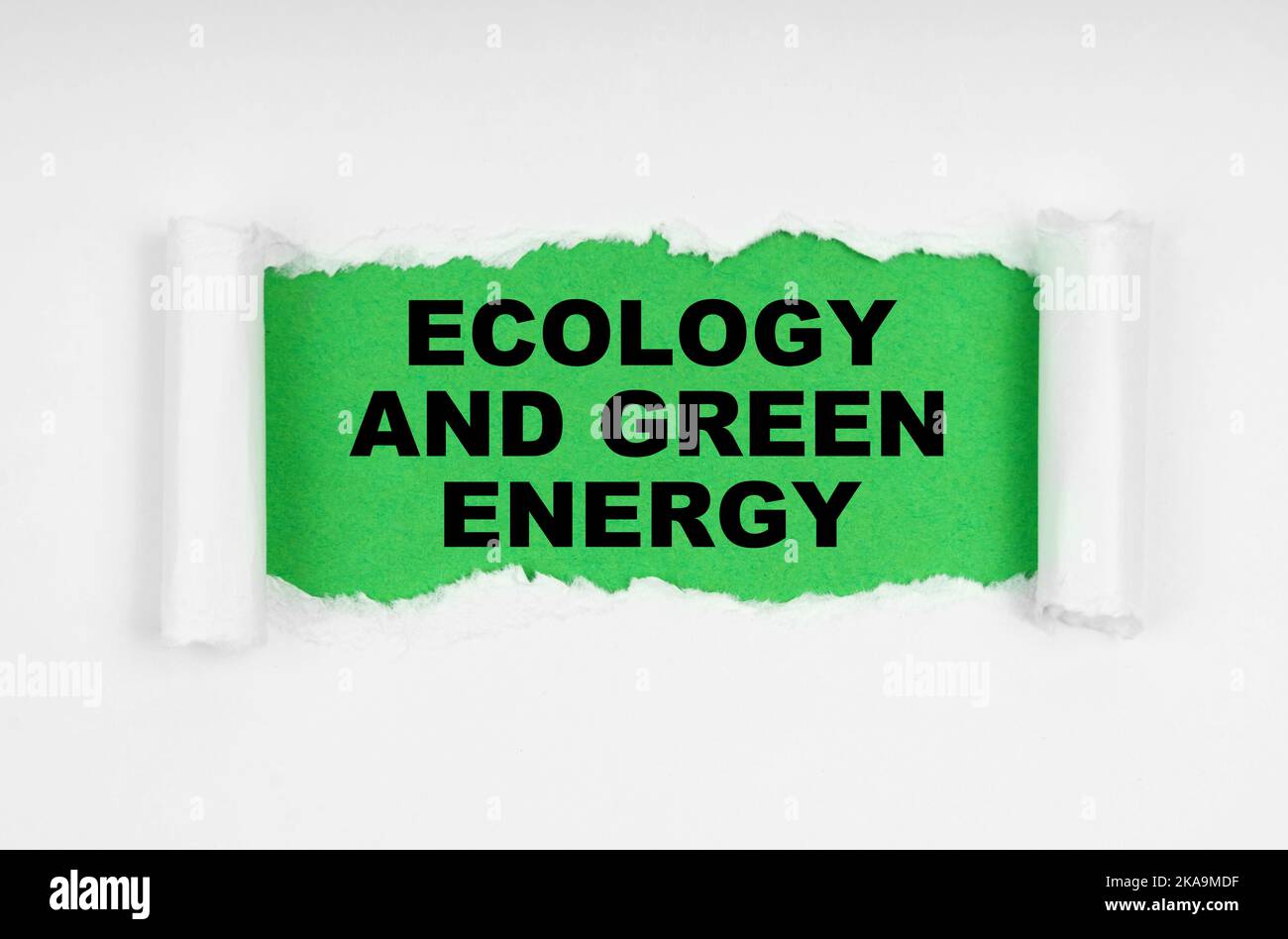 Environmental concept. In the middle of the white sheet, the paper is ...