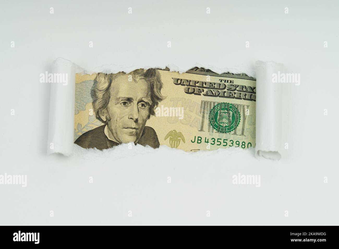 Business and finance concept. An image of a 20 dollar bill is visible ...