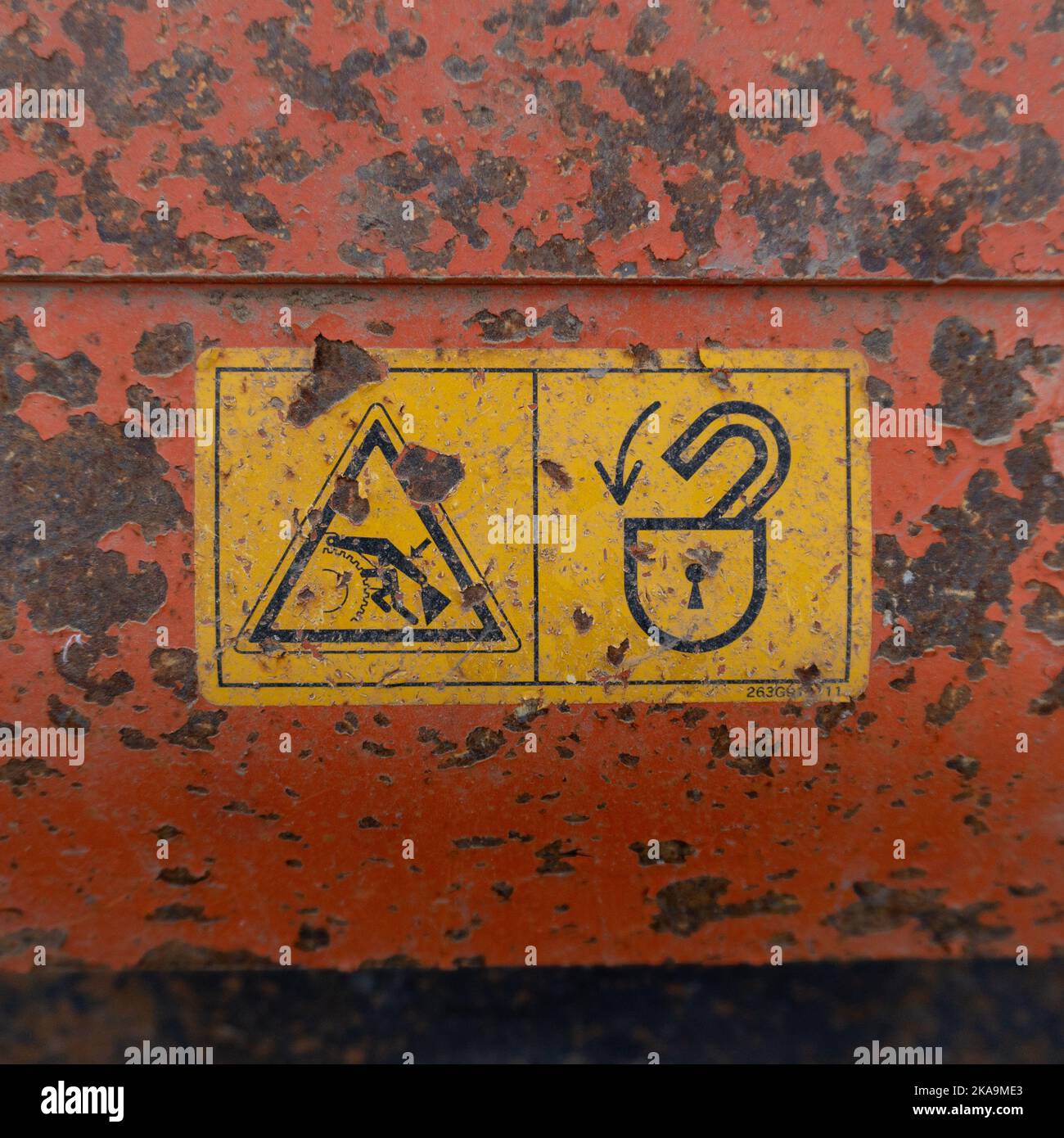 An old rusty metal surface with warning sign Stock Photo - Alamy