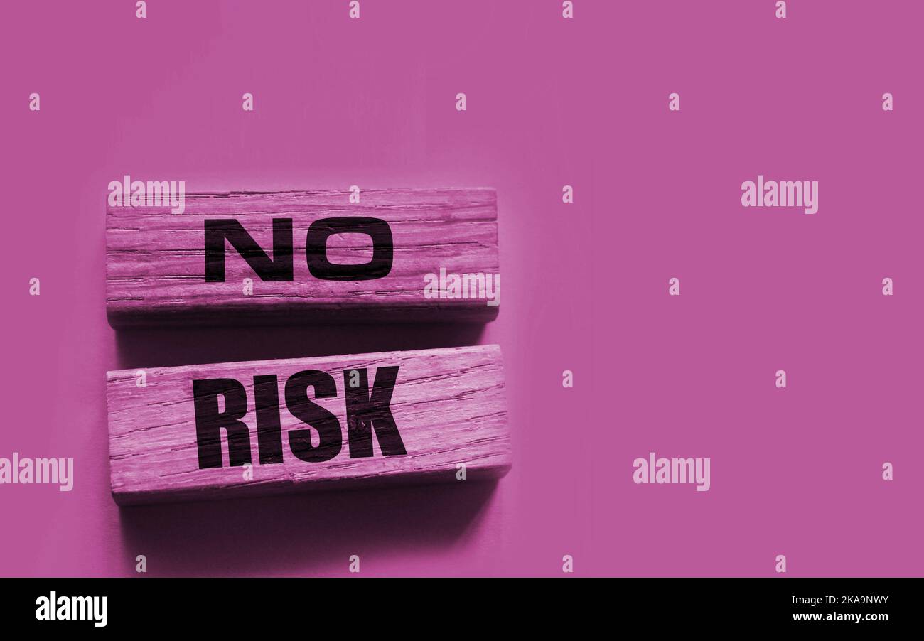No Risk words on wooden blocks on yellow background. Risk management ...