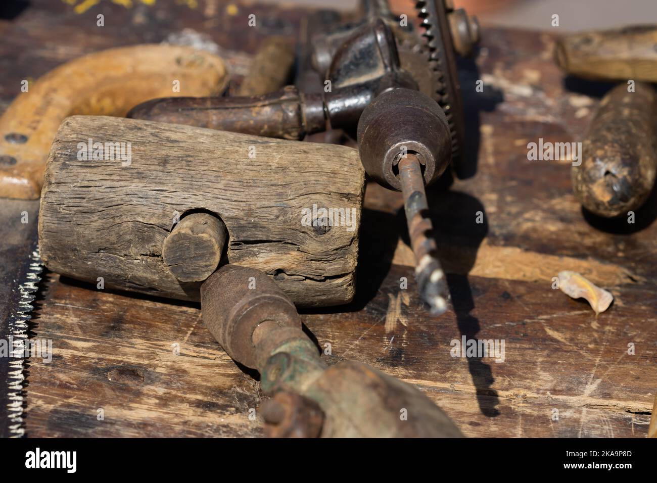 Antique artisan carpenter's tools on a wooden board, selective approach ...