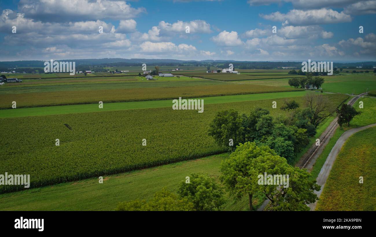 Drone View of Amish Countryside With Barns and Silos and Corn, Patch ...