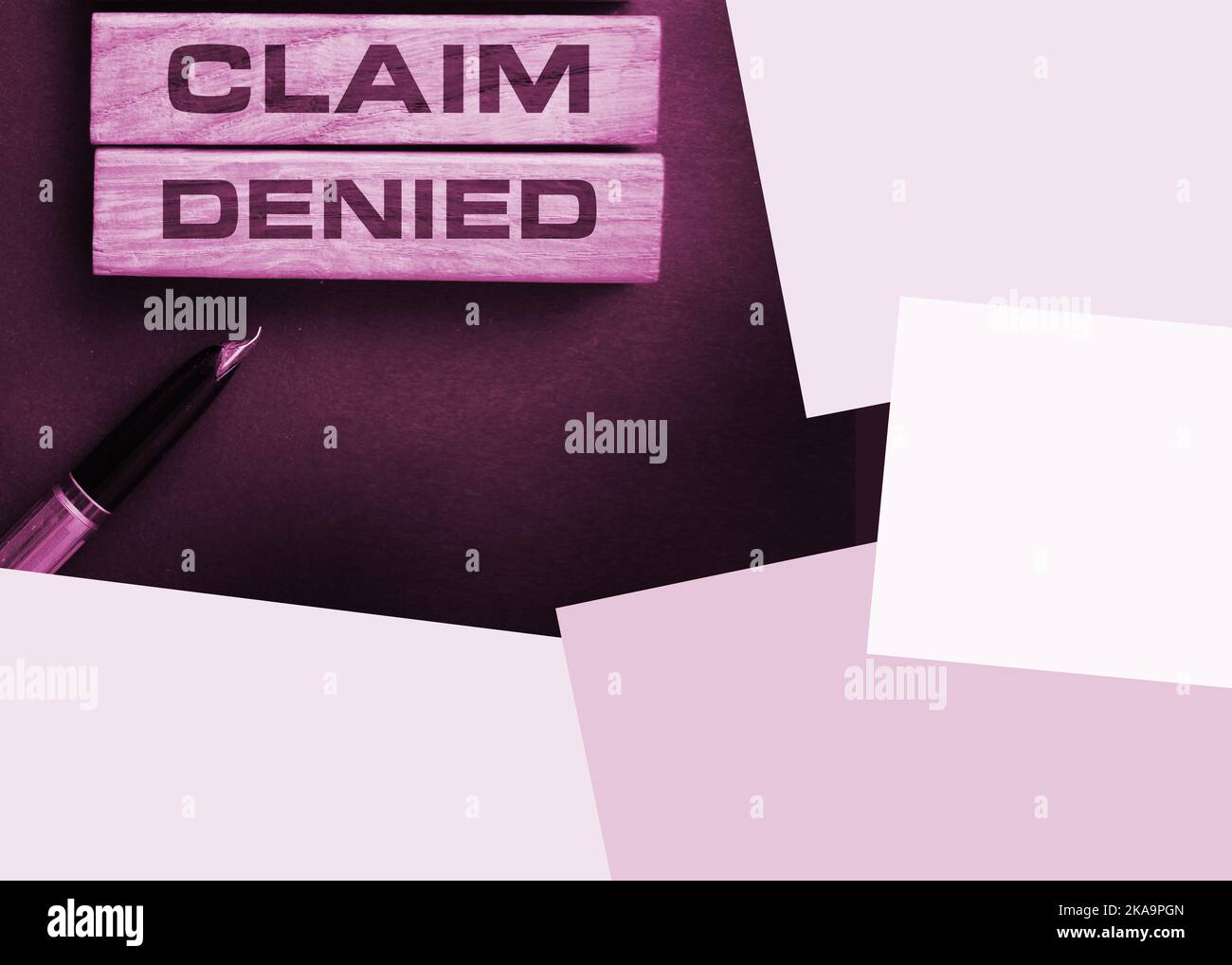 Claim Denied words on Wooden Blocks and luxury pen. Reject business ...