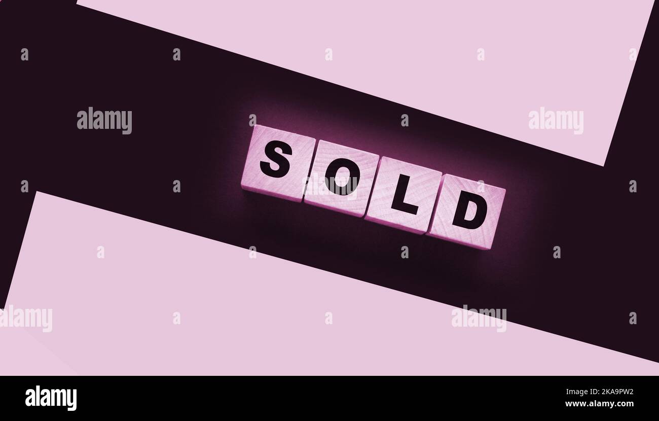 Sold Word Written In Wooden Cubes. Real estate business concept Stock ...