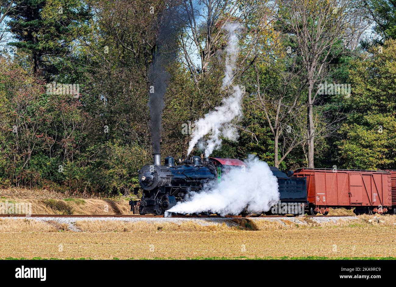 A View of a Restored Steam Freight Train Blowing Smoke and Steam ...