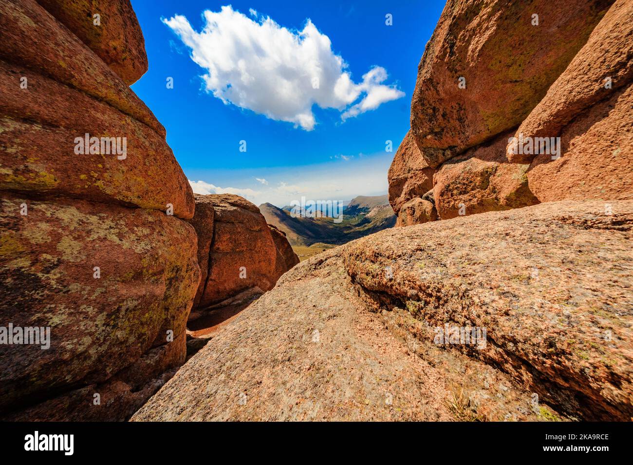 A scenic view of a landscape of rocky desert under a blue sky on a ...