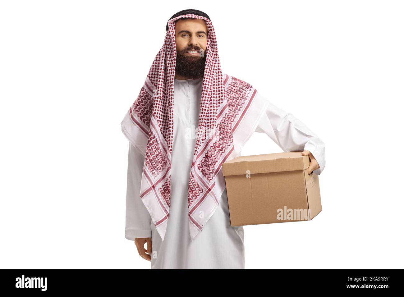 Saudi arab man in a thobe holding a cardboard box isolated on white ...