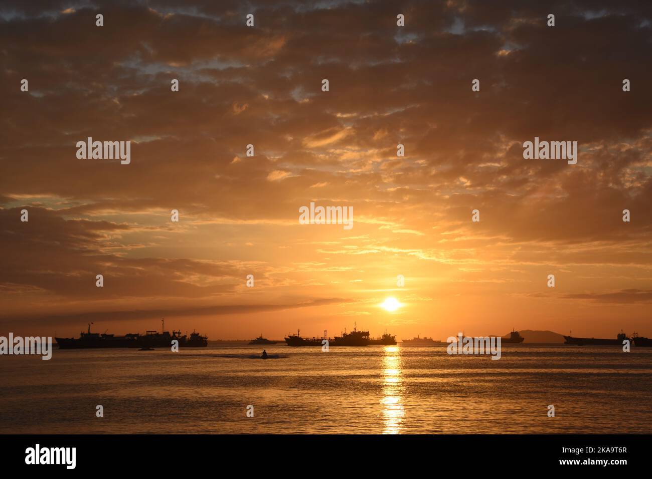 A golden sunset sky background over the lake Stock Photo - Alamy
