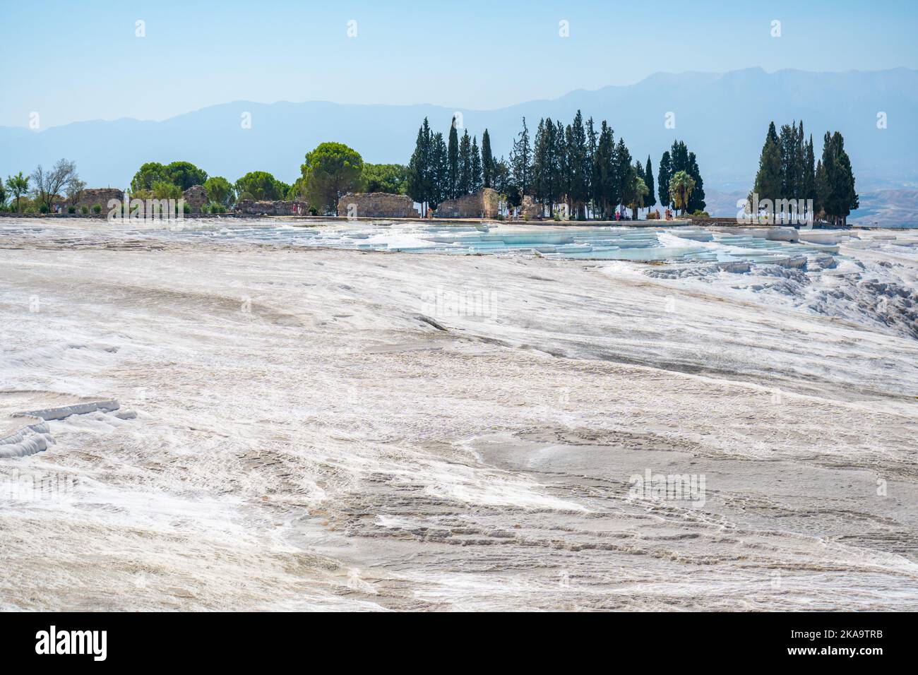 Calcite cliff of Pamukkale, white travertines in Turkey Stock Photo - Alamy