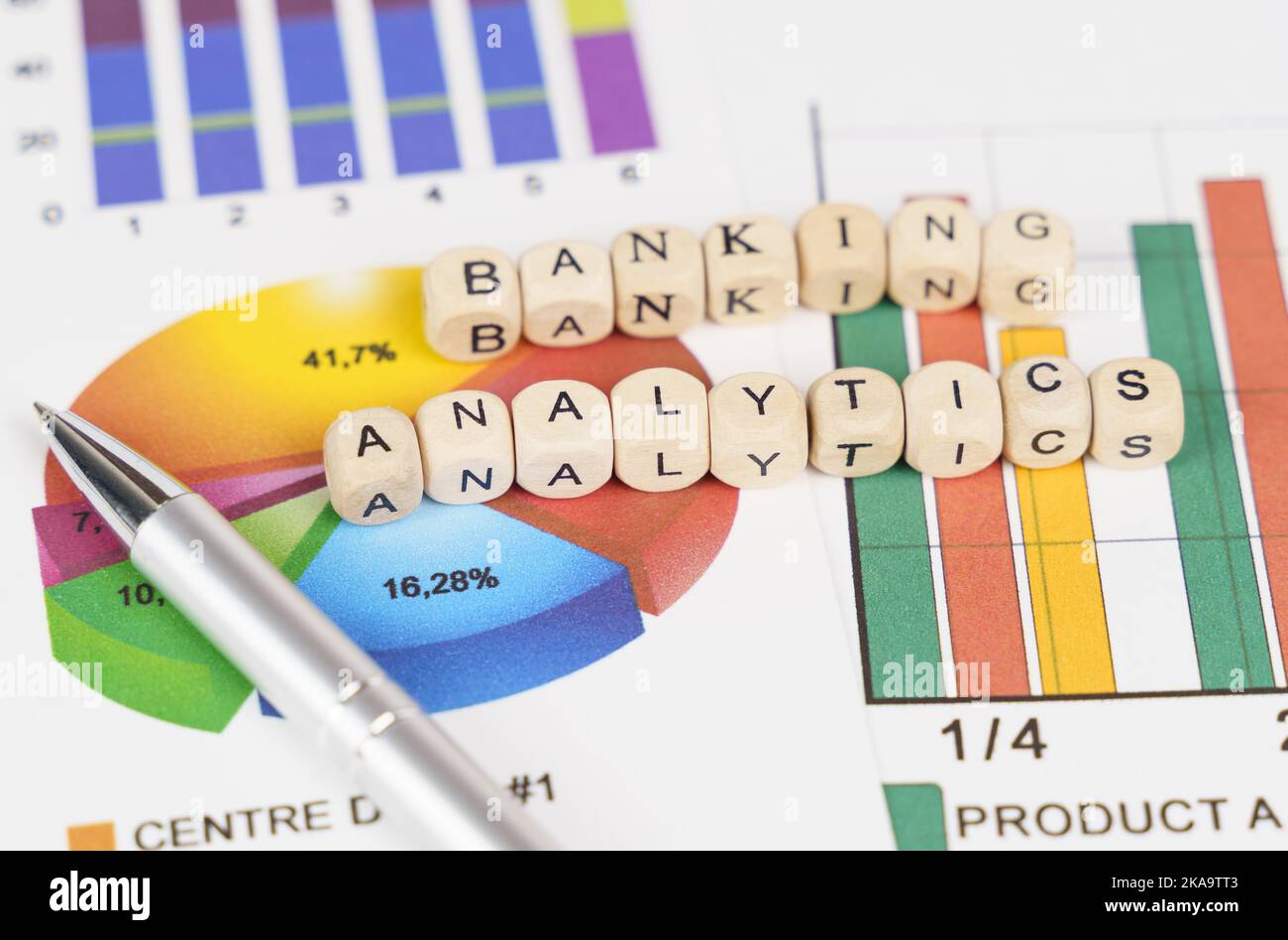 Business concept. On the charts with economic indicators are a pen and ...